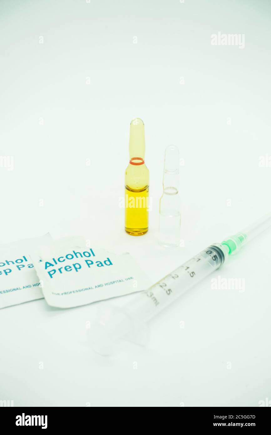 Medication ampoules for Intravenous injections on a wooden background ...