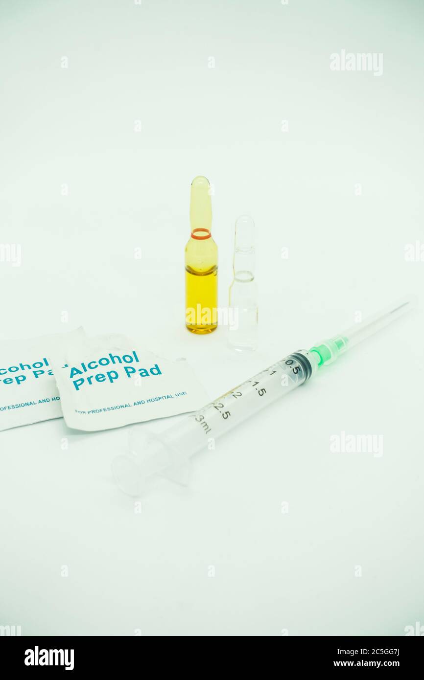 Medication ampoules for Intravenous injections on a wooden background ...