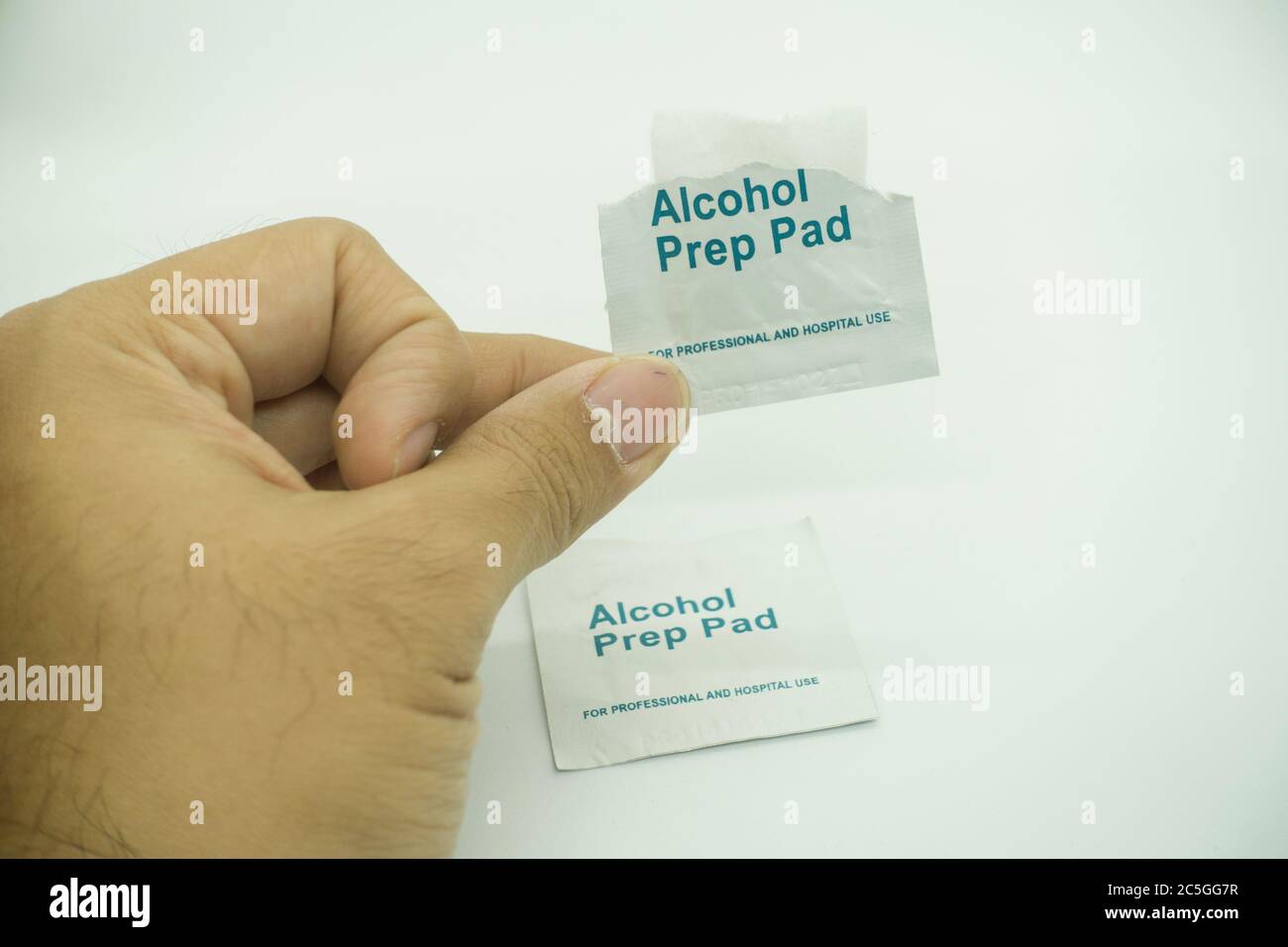 alcohol swab, isolated, used to sterilized skin area prior to injection ...