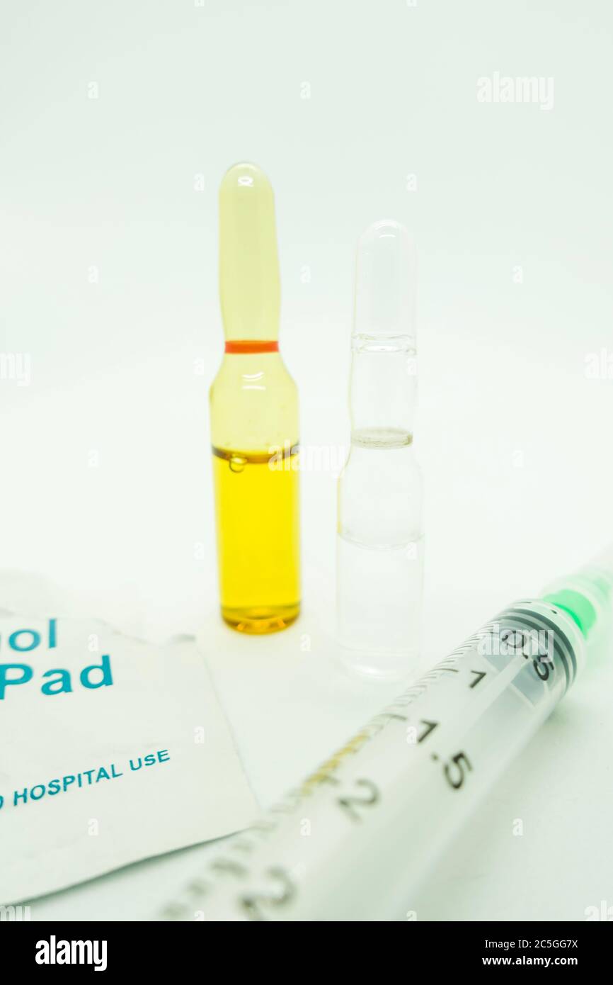 Medication ampoules for Intravenous injections on a wooden background ...