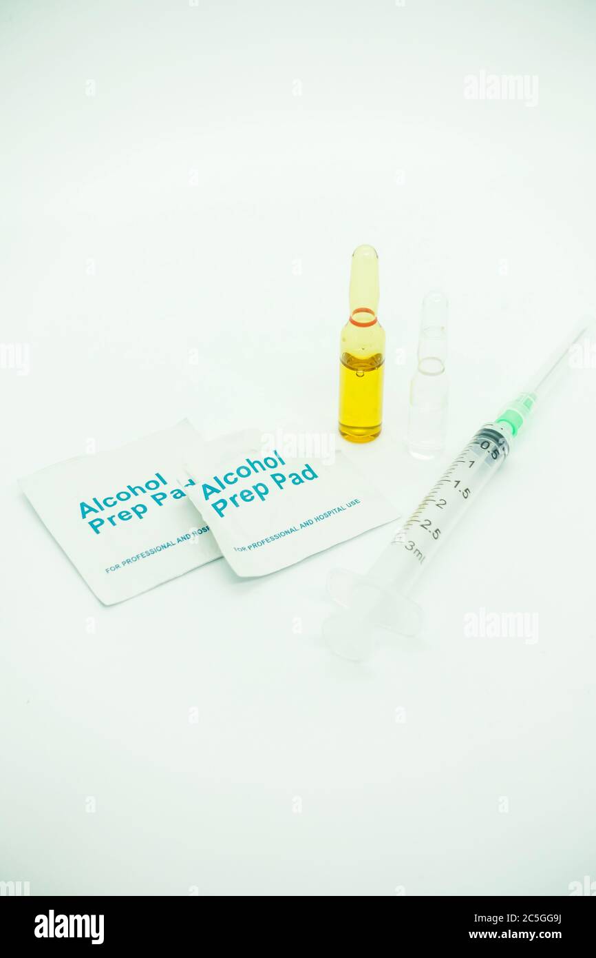 Medication ampoules for Intravenous injections on a wooden background ...