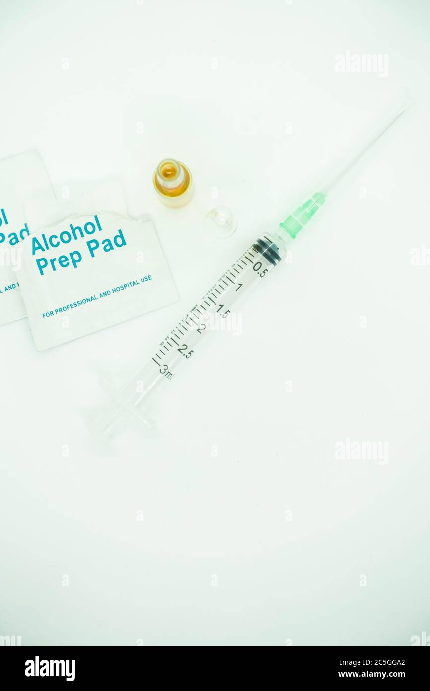 Medication ampoules for Intravenous injections on a wooden background ...