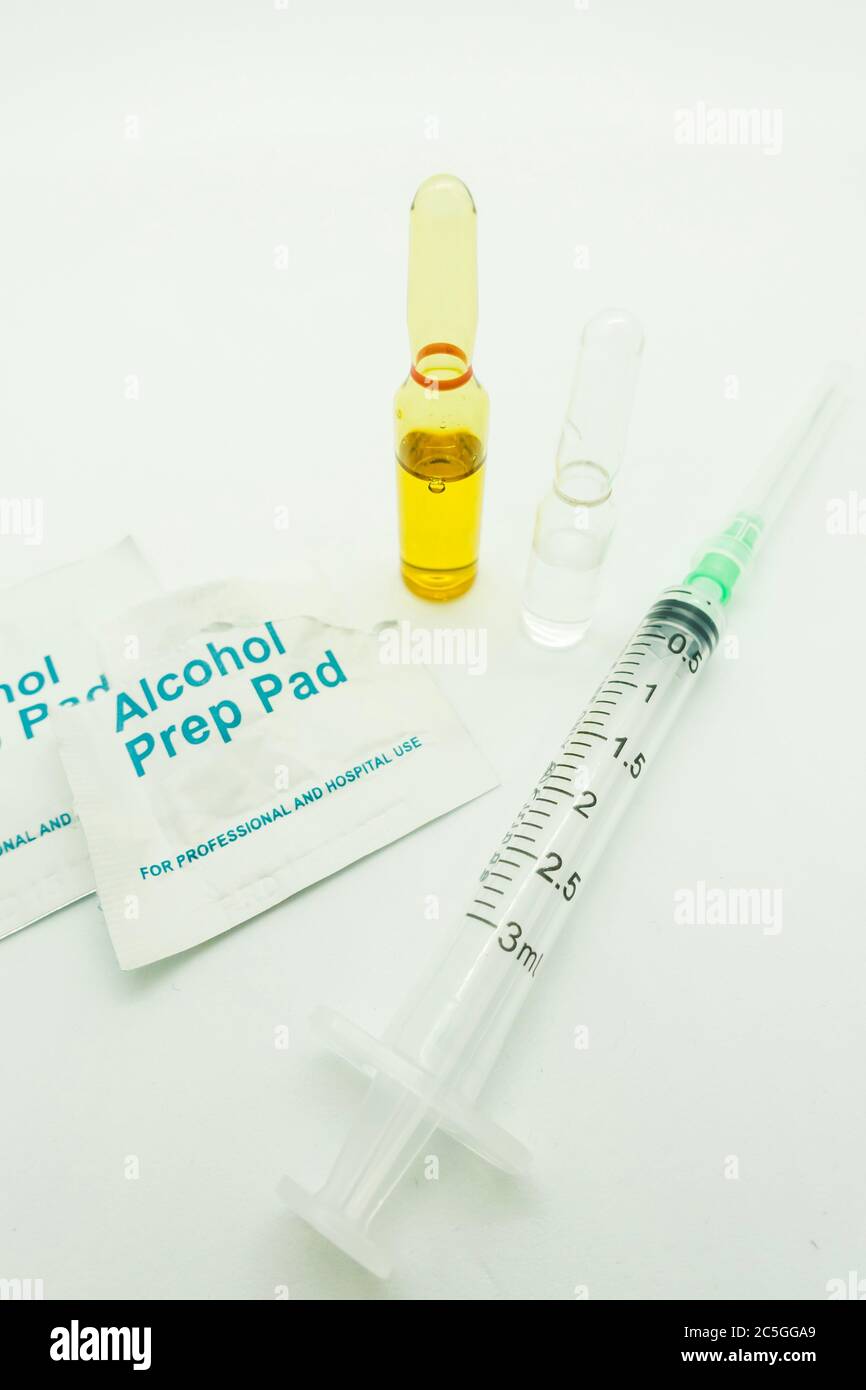 Medication ampoules for Intravenous injections on a wooden background ...