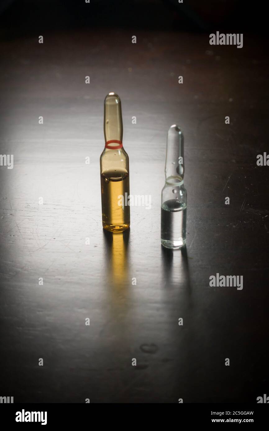 Medication ampoules for Intravenous injections on wooden background ...