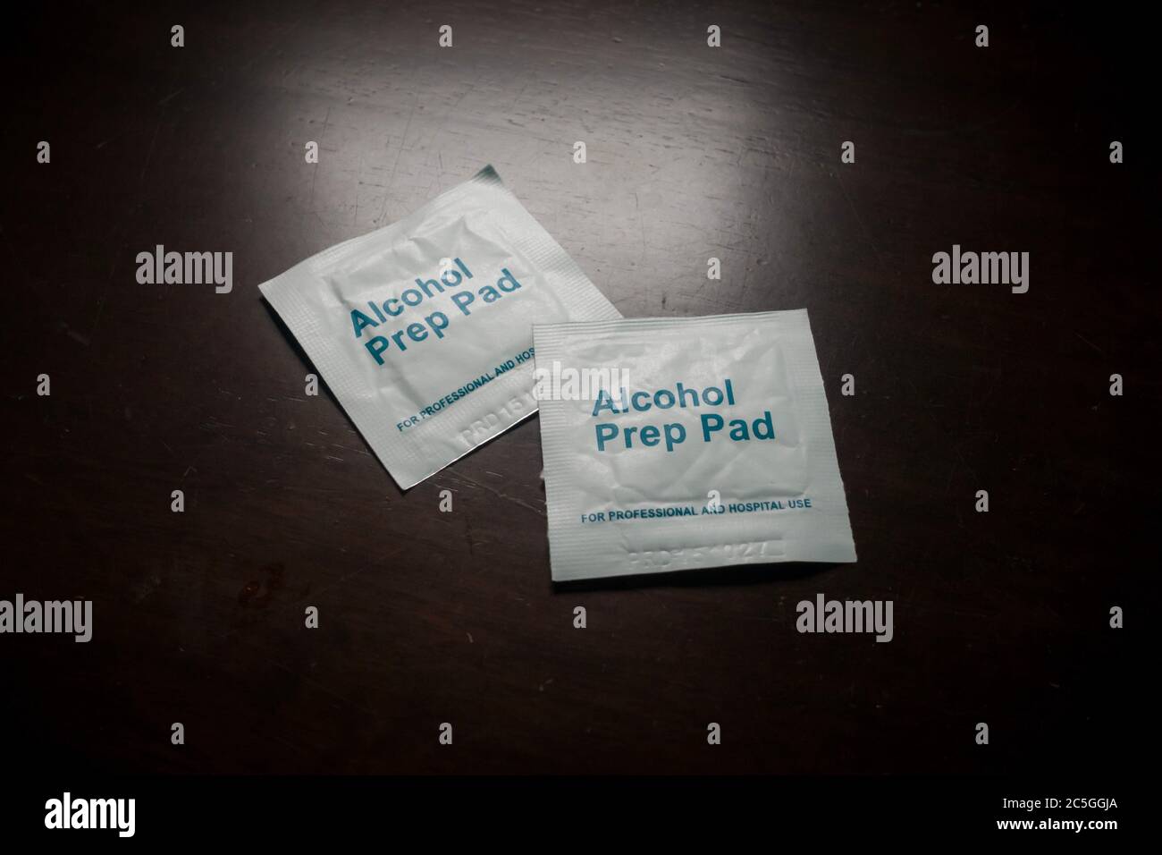 alcohol swab, isolated, used to sterilized skin area prior to injection ...