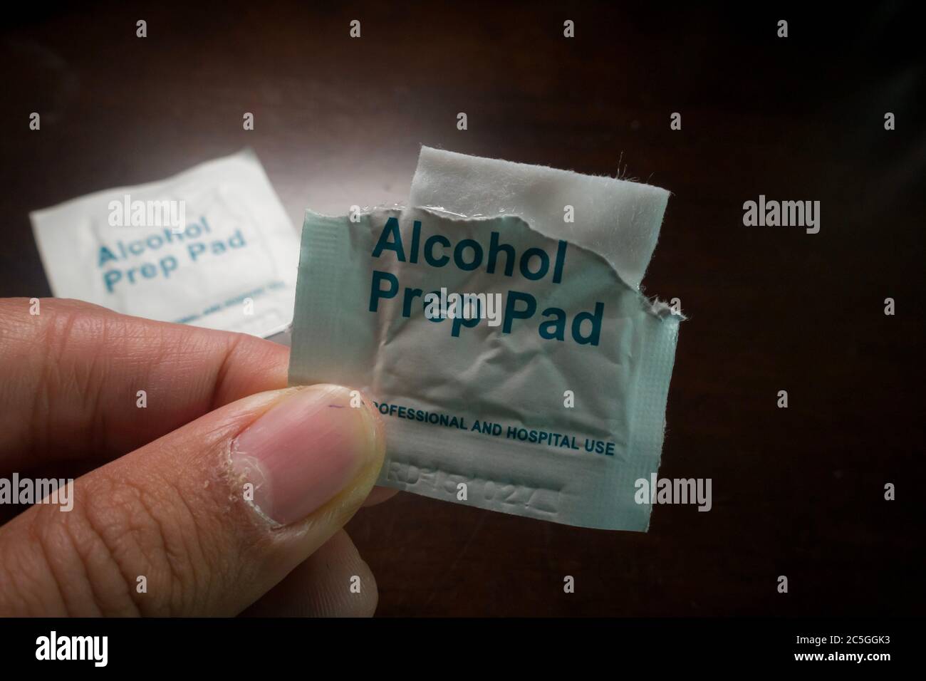 alcohol swab, isolated, used to sterilized skin area prior to injection ...