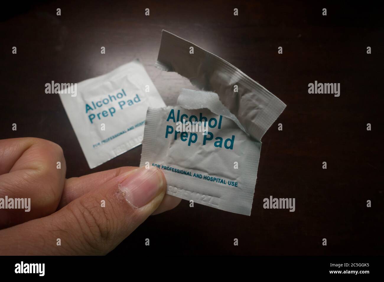 alcohol swab, isolated, used to sterilized skin area prior to injection ...