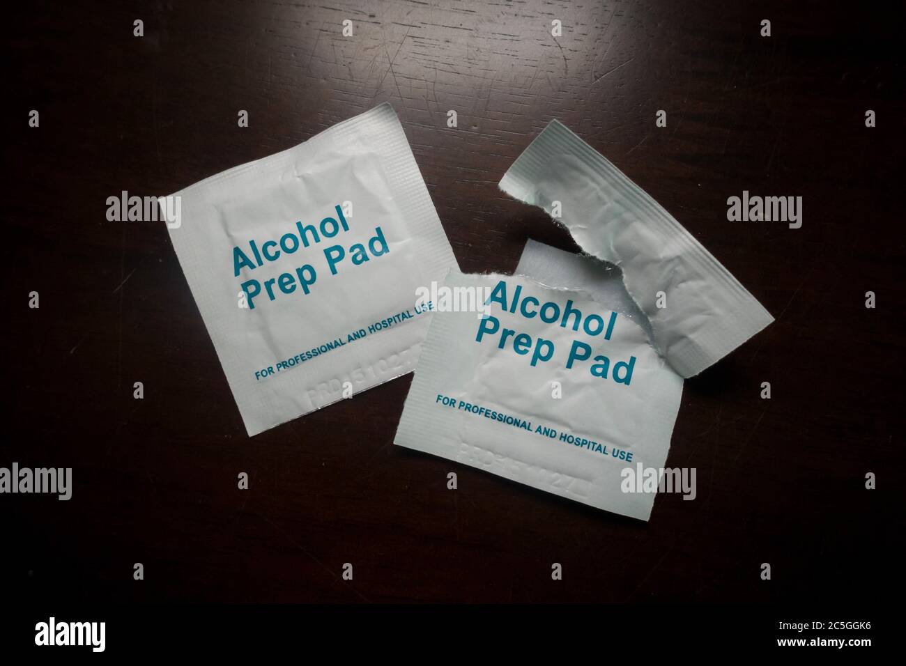 alcohol swab, isolated, used to sterilized skin area prior to injection ...