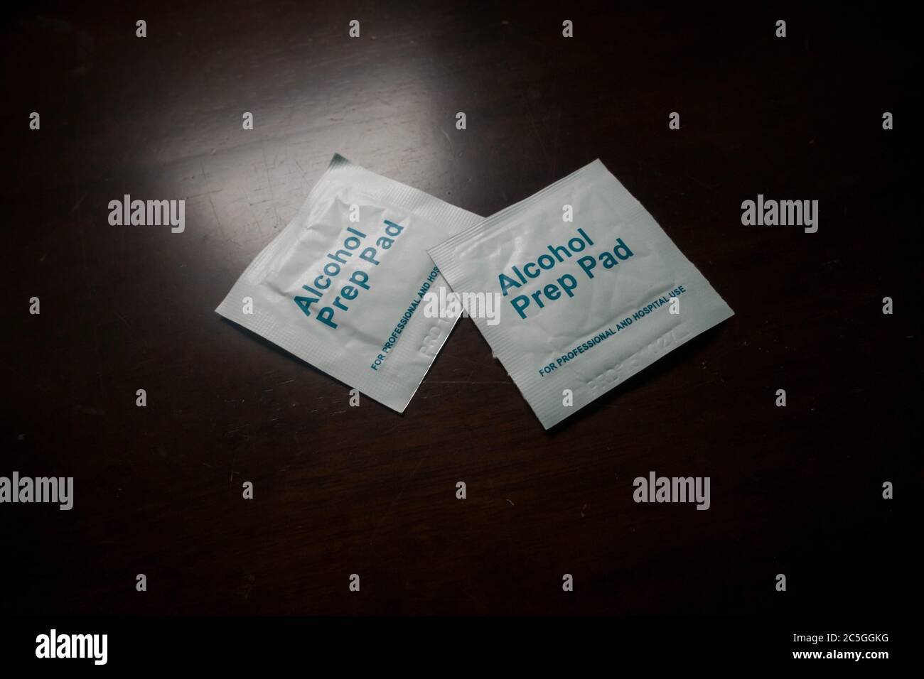 alcohol swab, isolated, used to sterilized skin area prior to injection ...