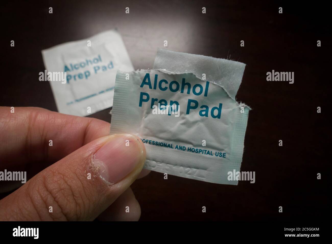 alcohol swab, isolated, used to sterilized skin area prior to injection ...