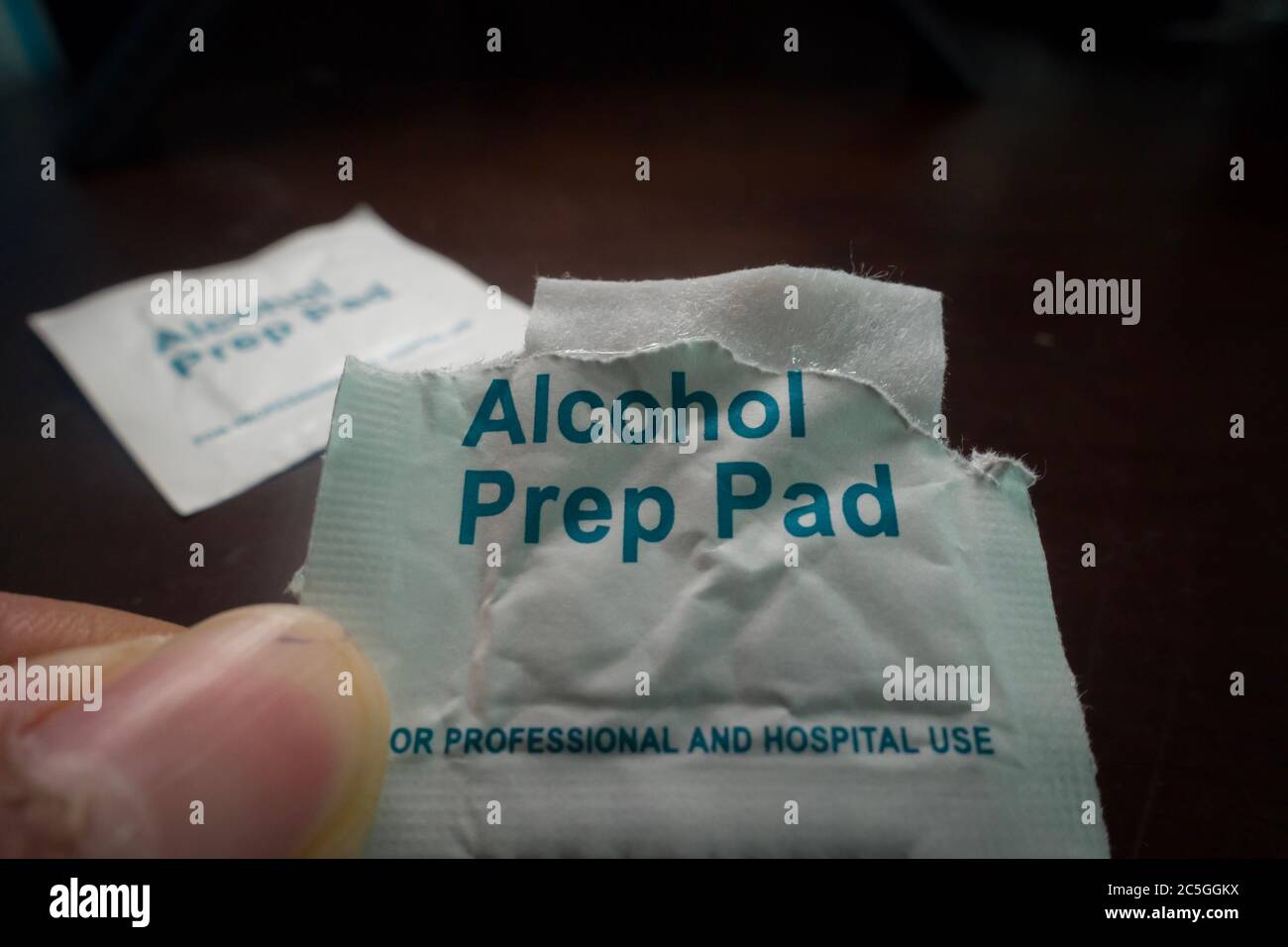 alcohol swab, isolated, used to sterilized skin area prior to injection ...