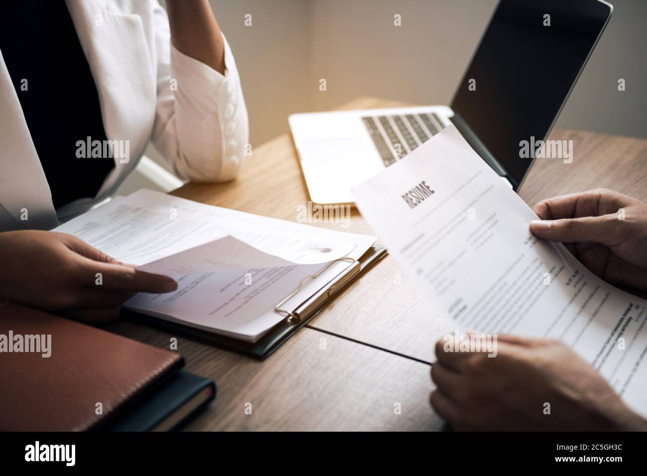 Employees are explaining about their past work experience for job ...