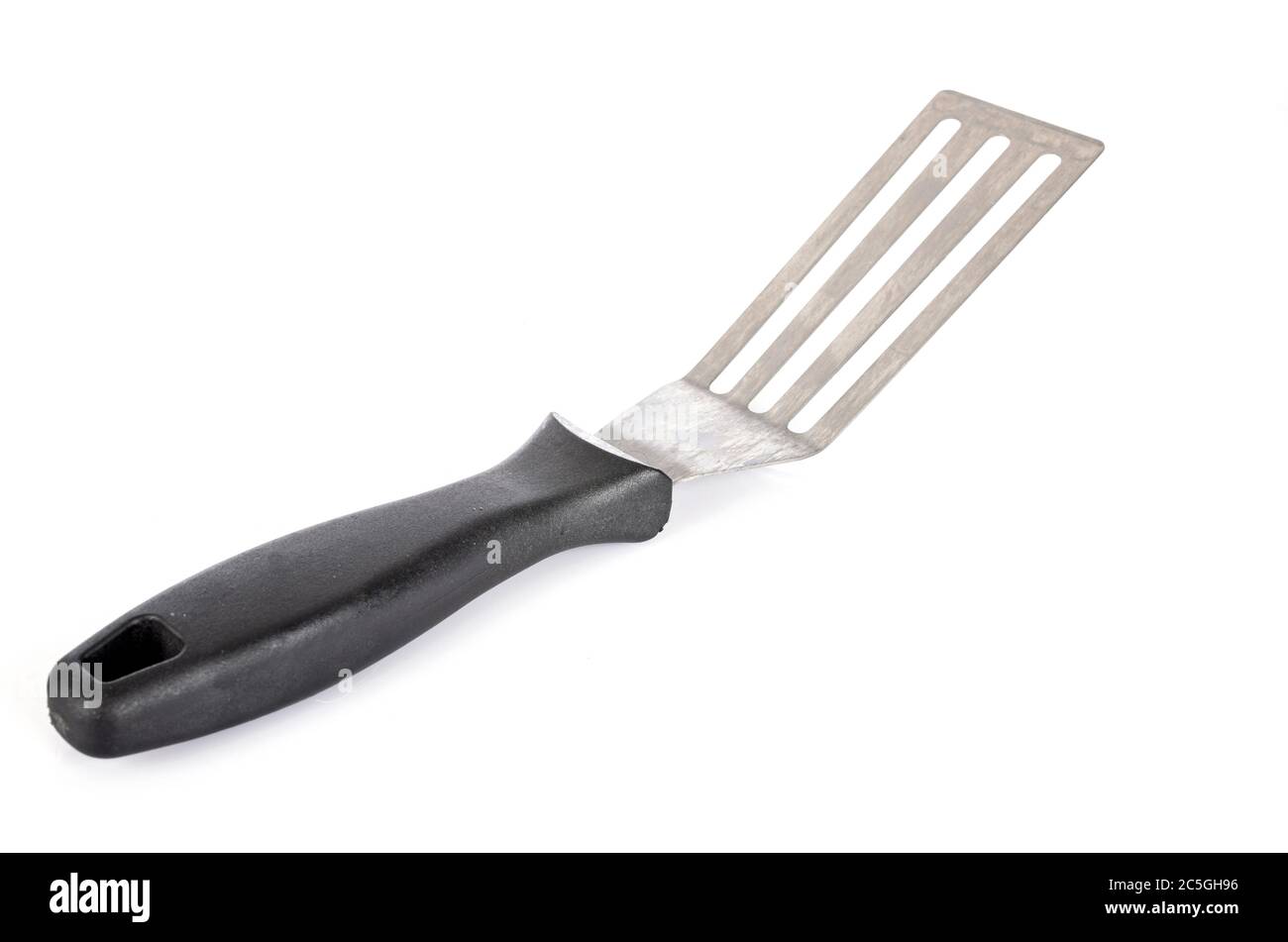 metal spatula in front of white background Stock Photo - Alamy