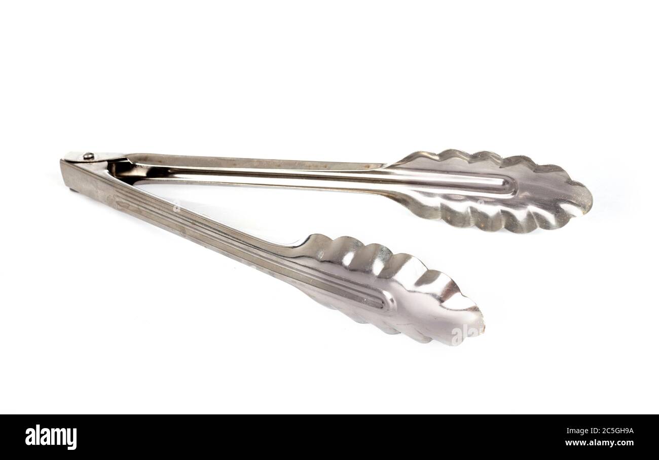 cuisine pliers in front of white background Stock Photo - Alamy