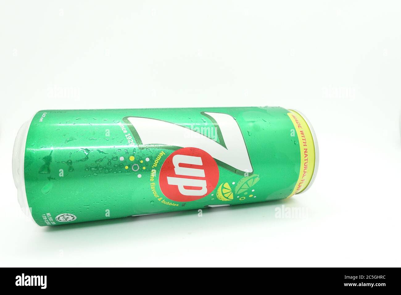 A can of 7up drink against isolated on white background, a tasty fruits ...