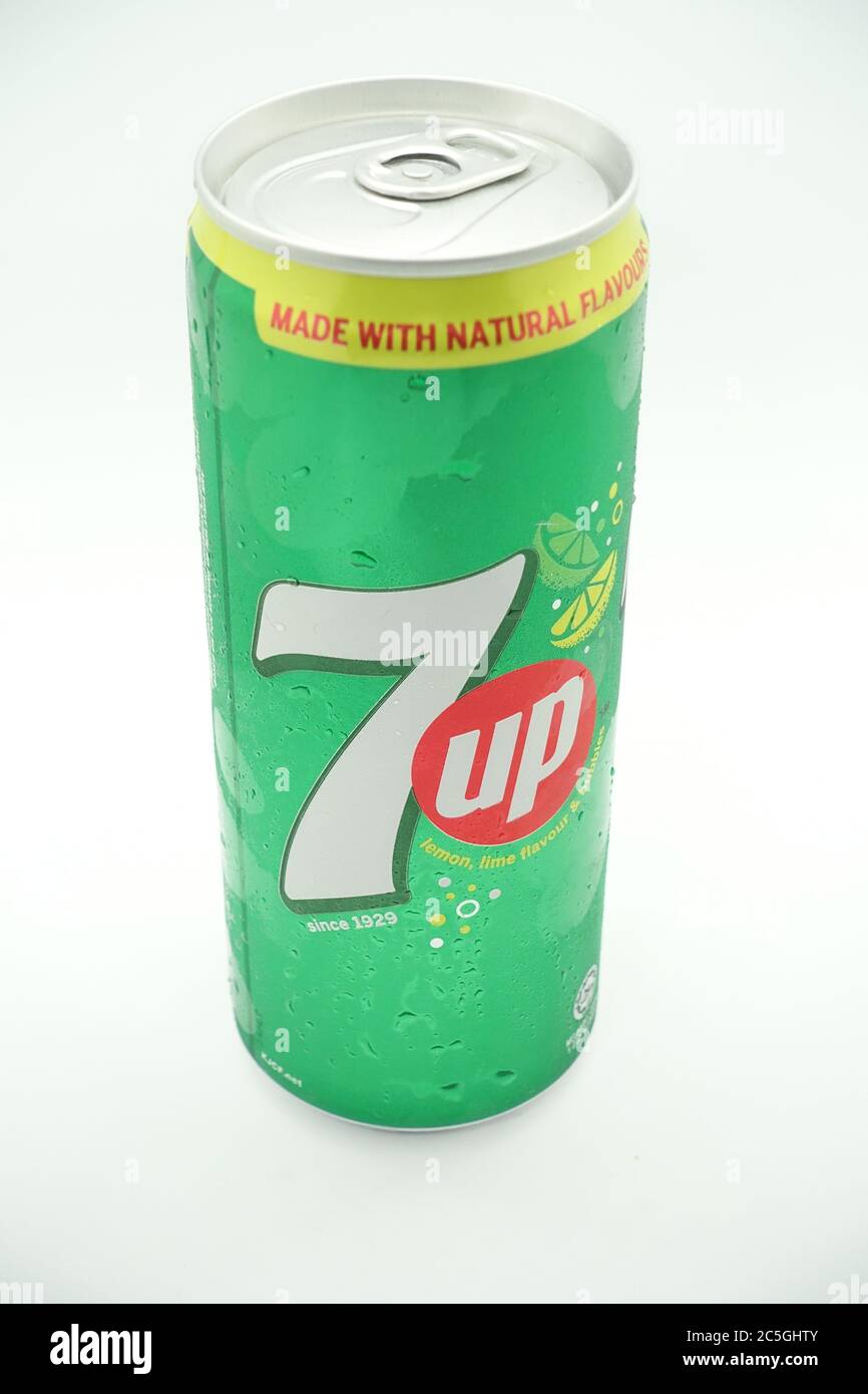 A can of 7up drink against isolated on white background, a tasty fruits ...