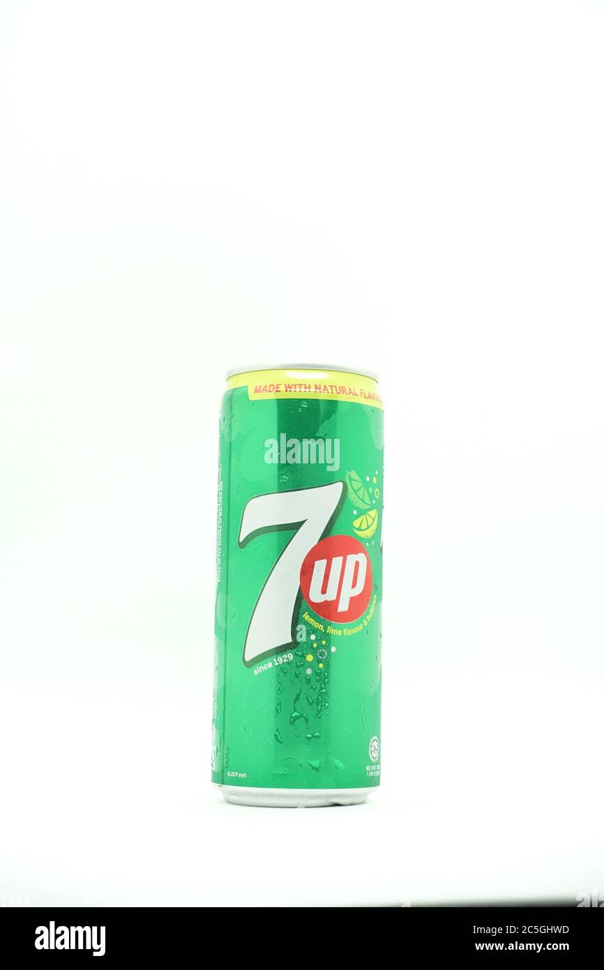 A can of 7up drink against isolated on white background, a tasty fruits ...
