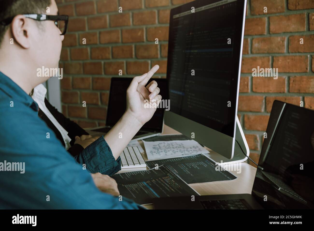 Developing programming and coding technologies working in a software ...