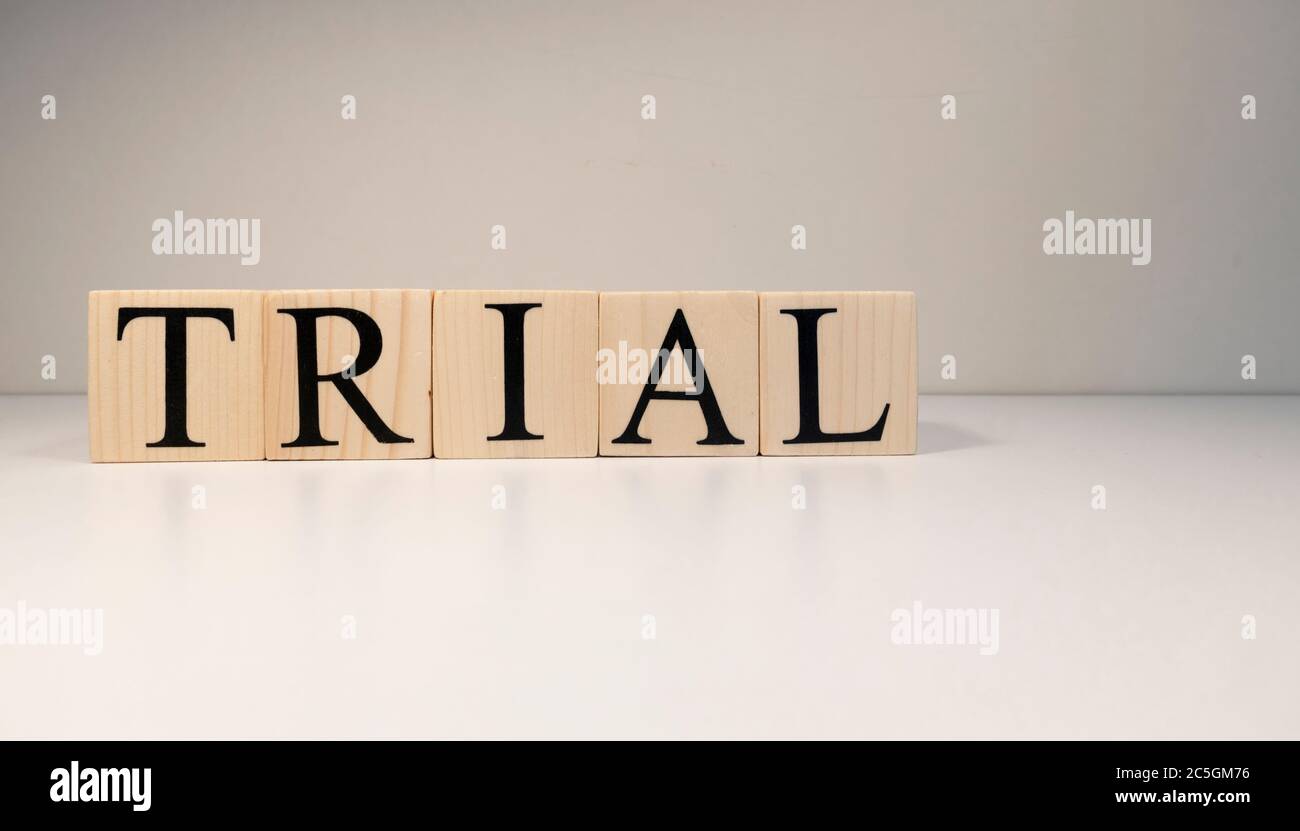 Trial word from wooden cubes. About legal terms Stock Photo - Alamy