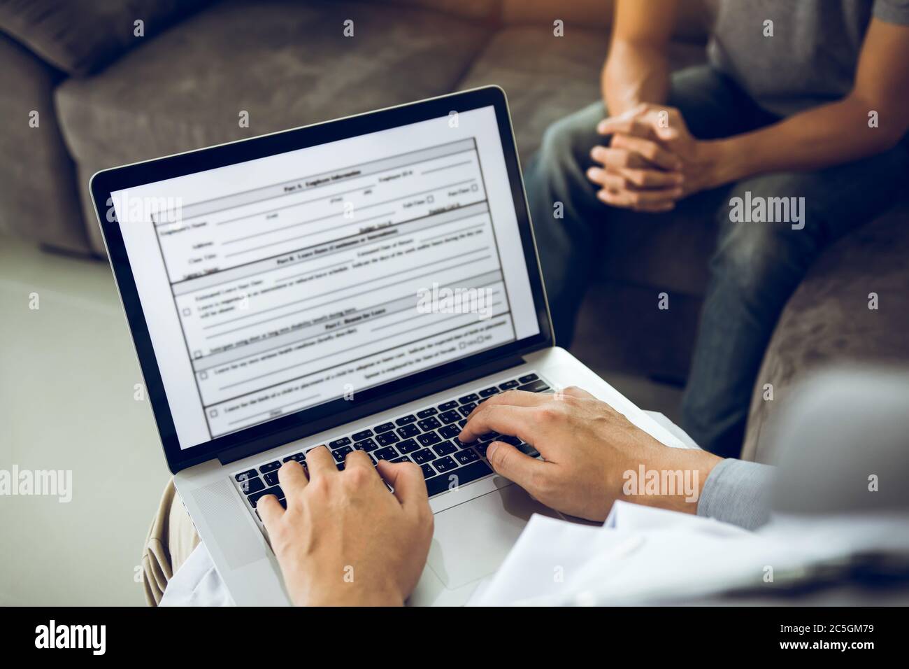 Doctor giving patient note hi-res stock photography and images - Alamy