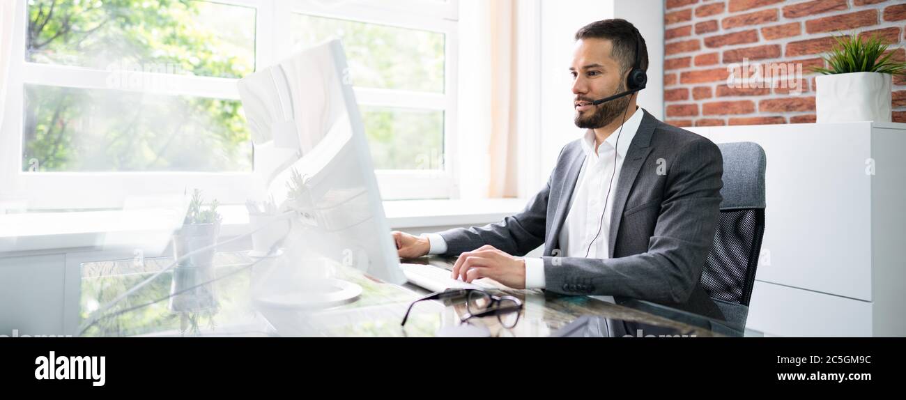 Customer Service Agent Man In Call Center Stock Photo - Alamy