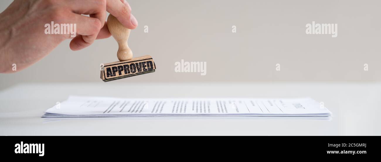 Work Permit And Document Record Approved Stamper Stock Photo - Alamy