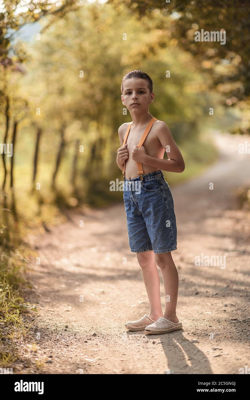 portrait of a boy outside Stock Photo - Alamy