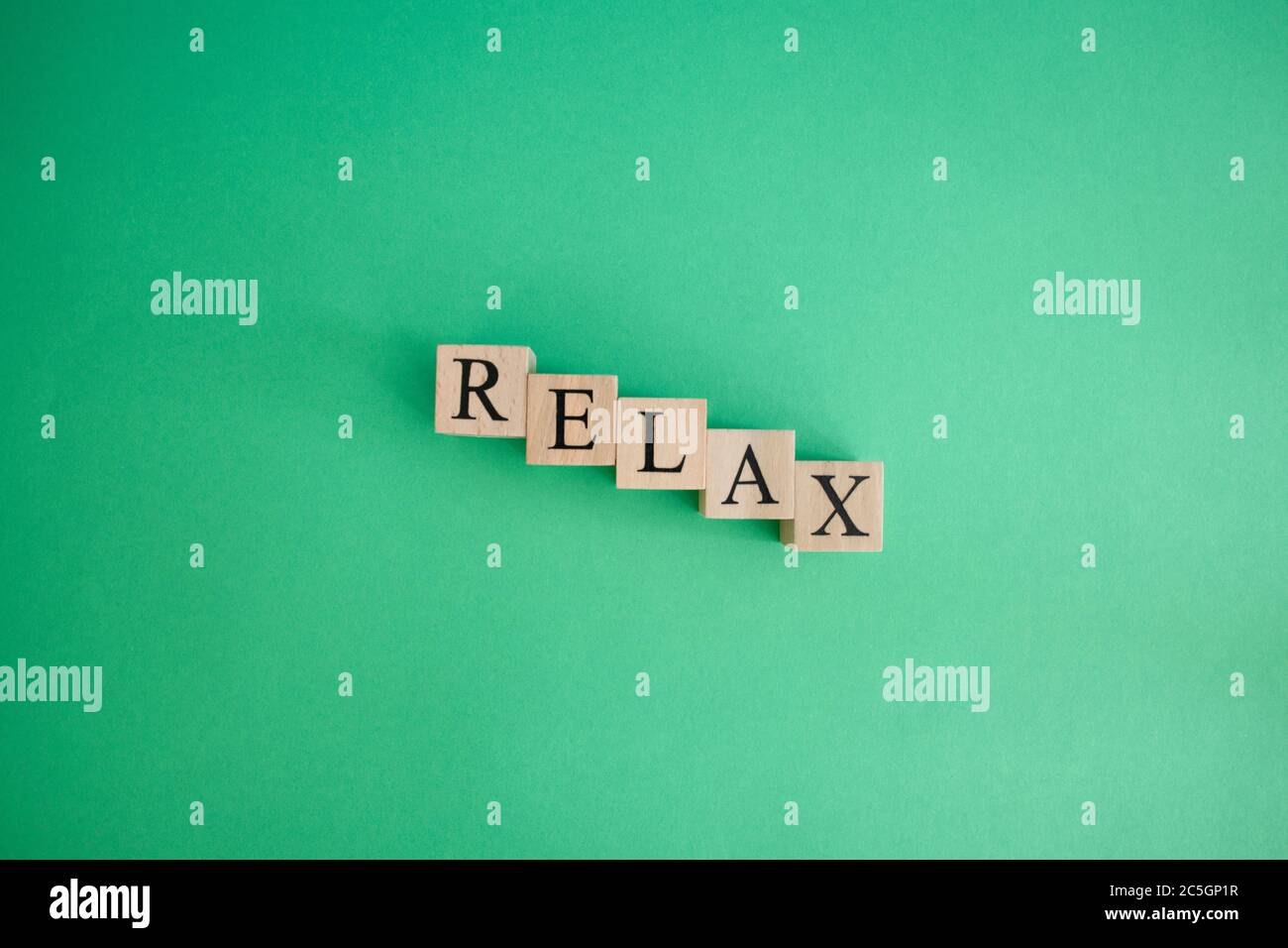 The word relax made from wooden cubes. Rest and calm concept Stock ...