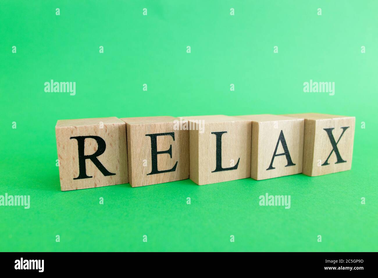 The word relax made from wooden cubes. Rest and calm concept Stock ...