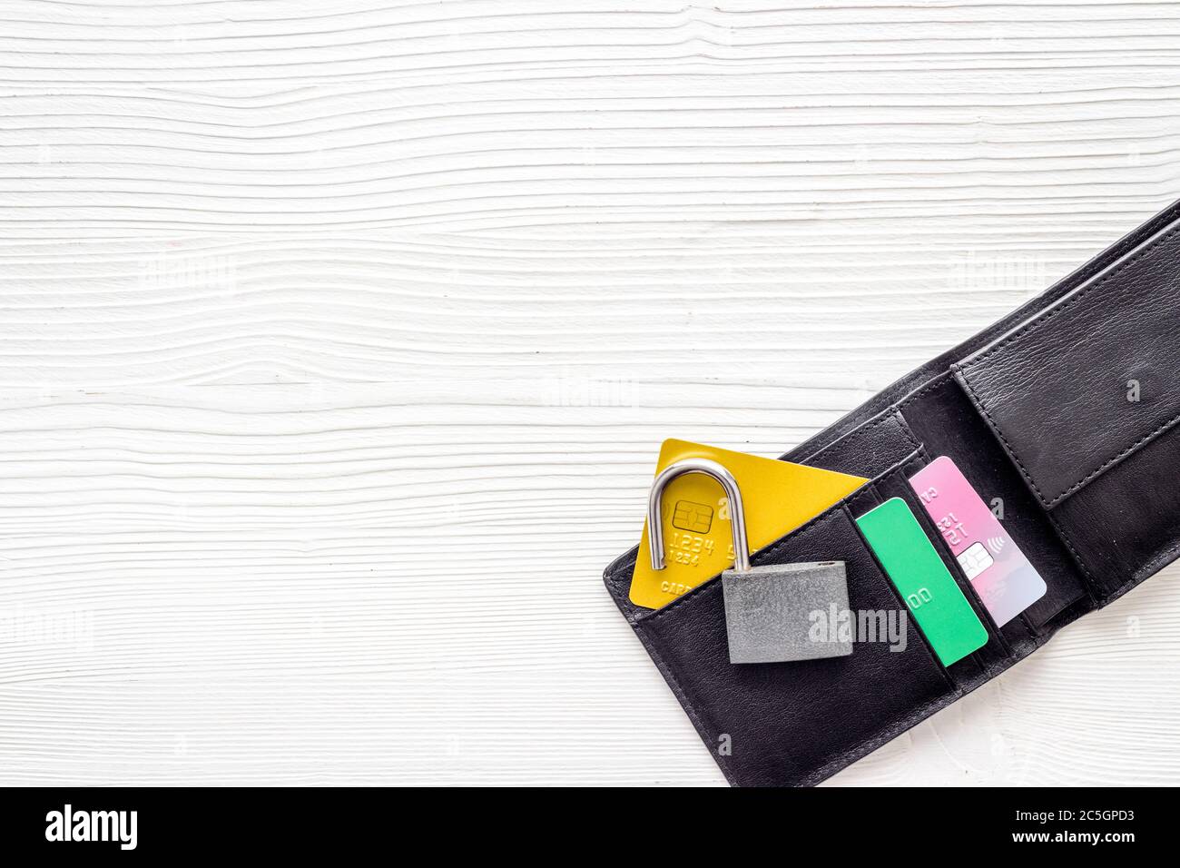 Credit card security concept with lock, wallet on white table from ...
