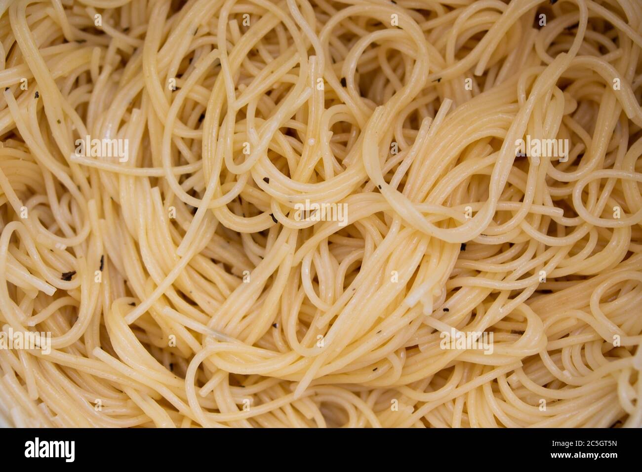 a spaghetti in large quantities closely cooked Stock Photo - Alamy