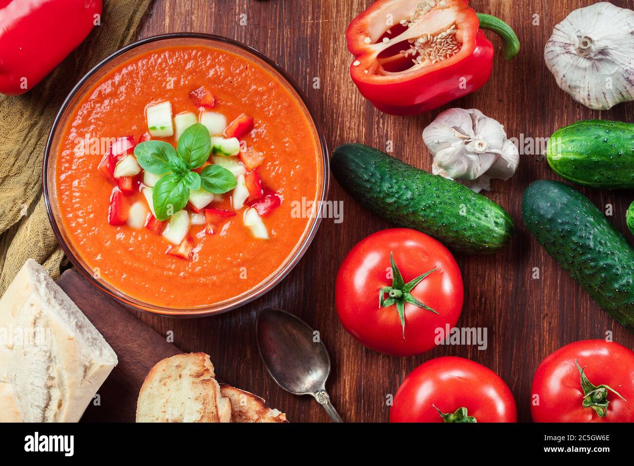 Spicy homemade gazpacho soup served with jamon ham. Traditional spanish ...