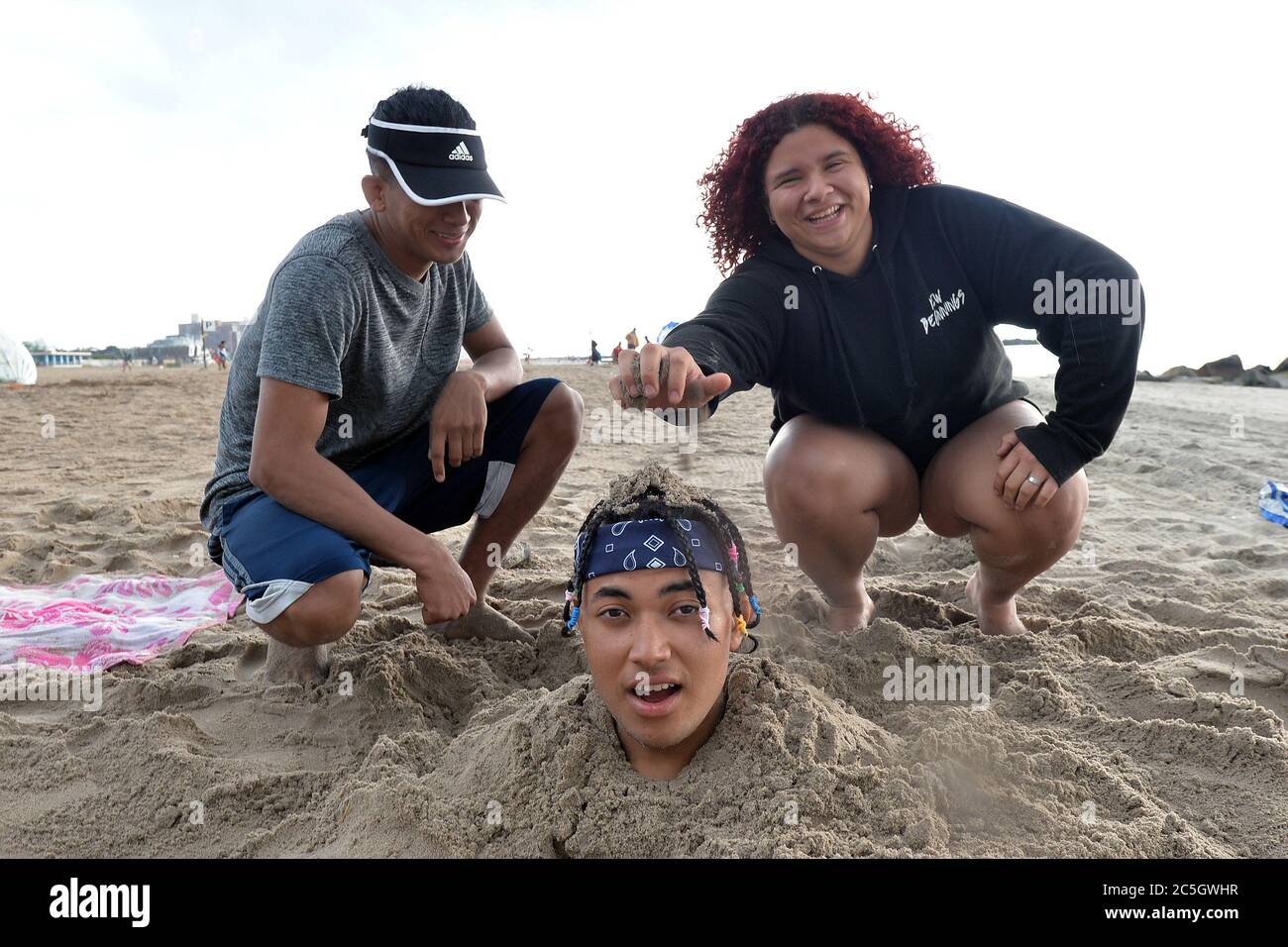 Buried up to neck hi-res stock photography and images - Alamy
