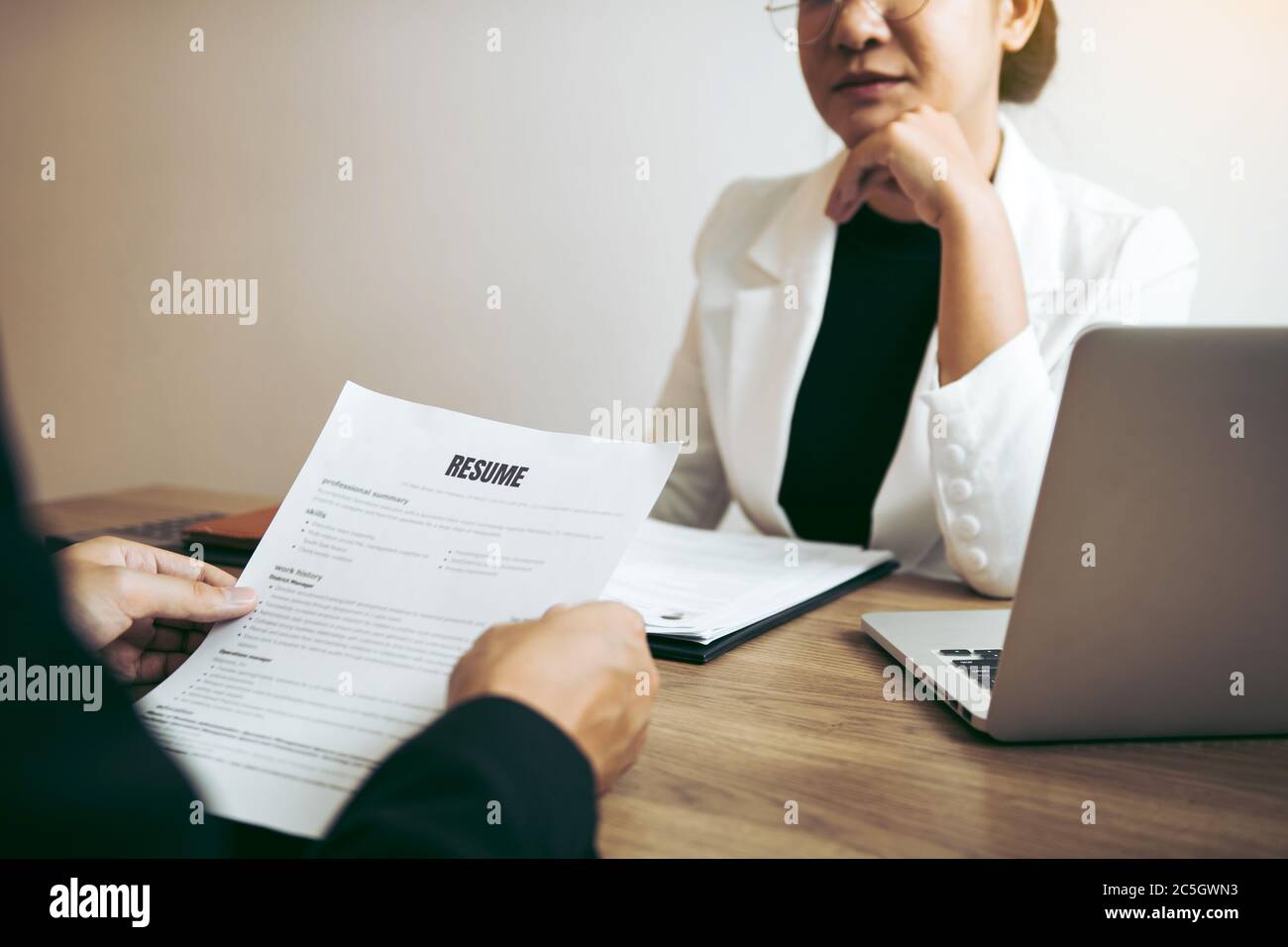 Employees are explaining about their past work experience for job ...