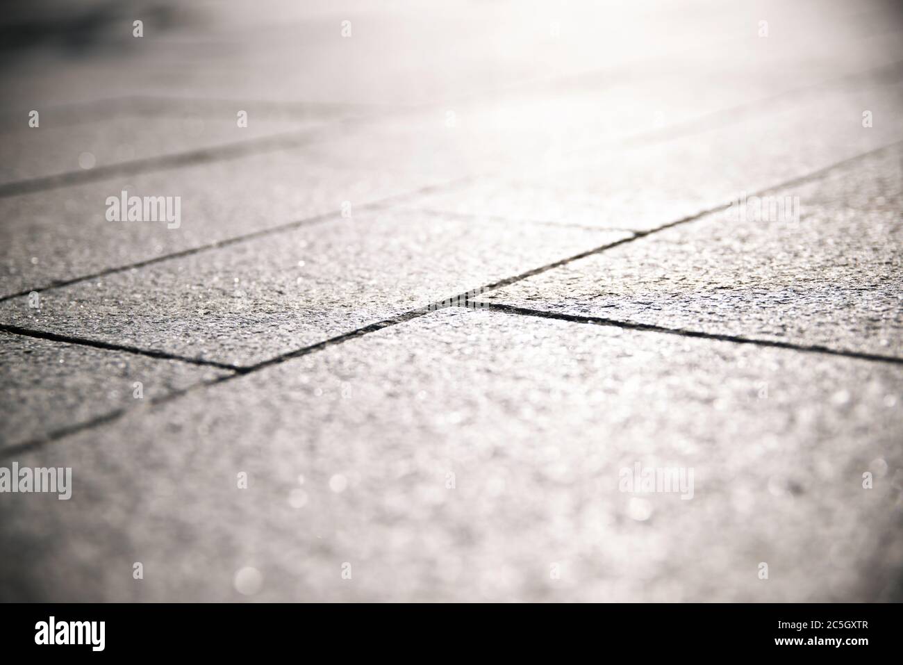 Floor of a street with stone tiles Stock Photo - Alamy