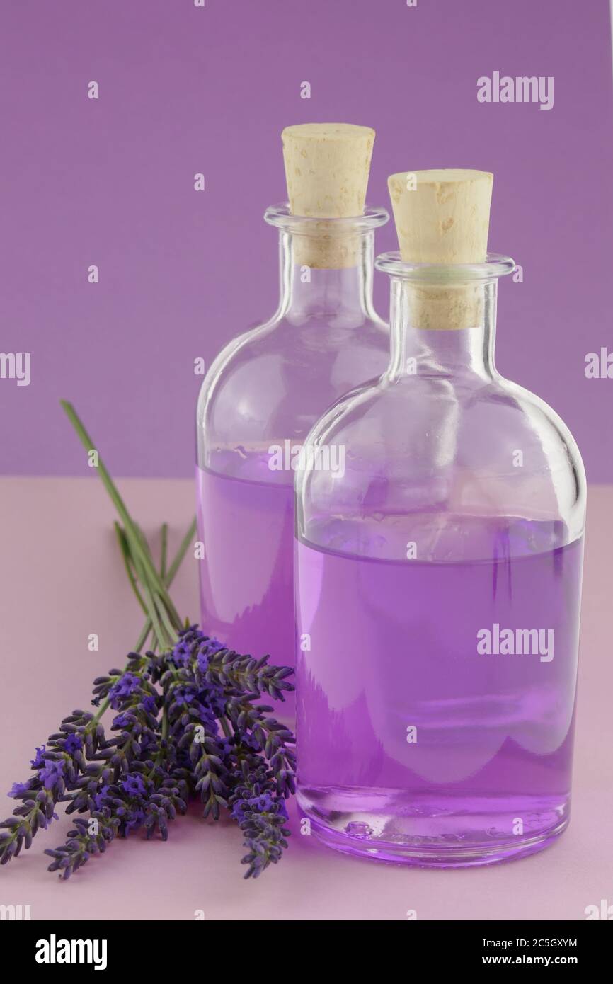Lavender water. Lavender Extract.Lavender essence in transparent ...