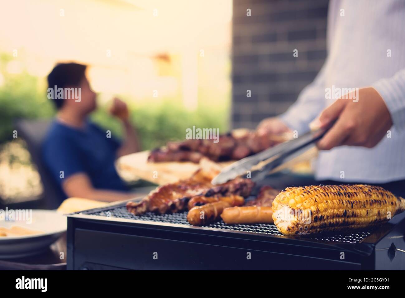 Man eating pork ribs hi-res stock photography and images - Alamy