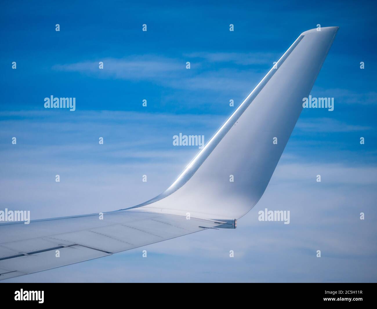Flying over the clouds Inflight airplane wing Stock Photo - Alamy