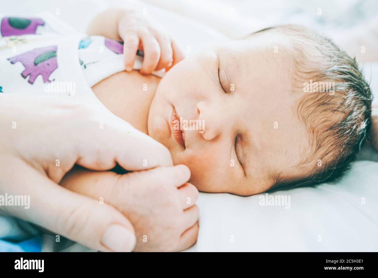 Lovely real image of a new born in her first day of life Stock Photo ...