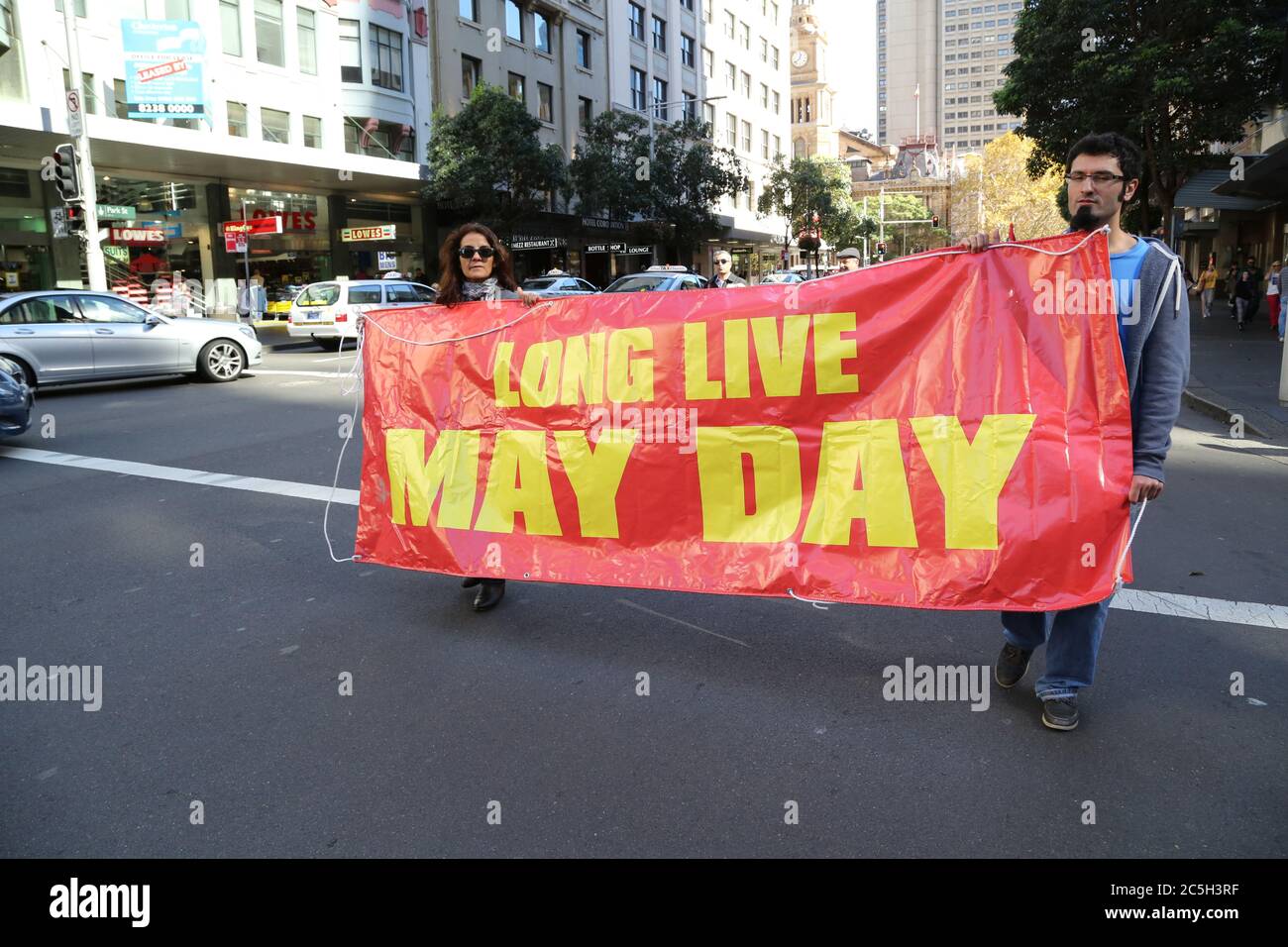 People take part in the annual Sydney May Day march on Park Street with ...