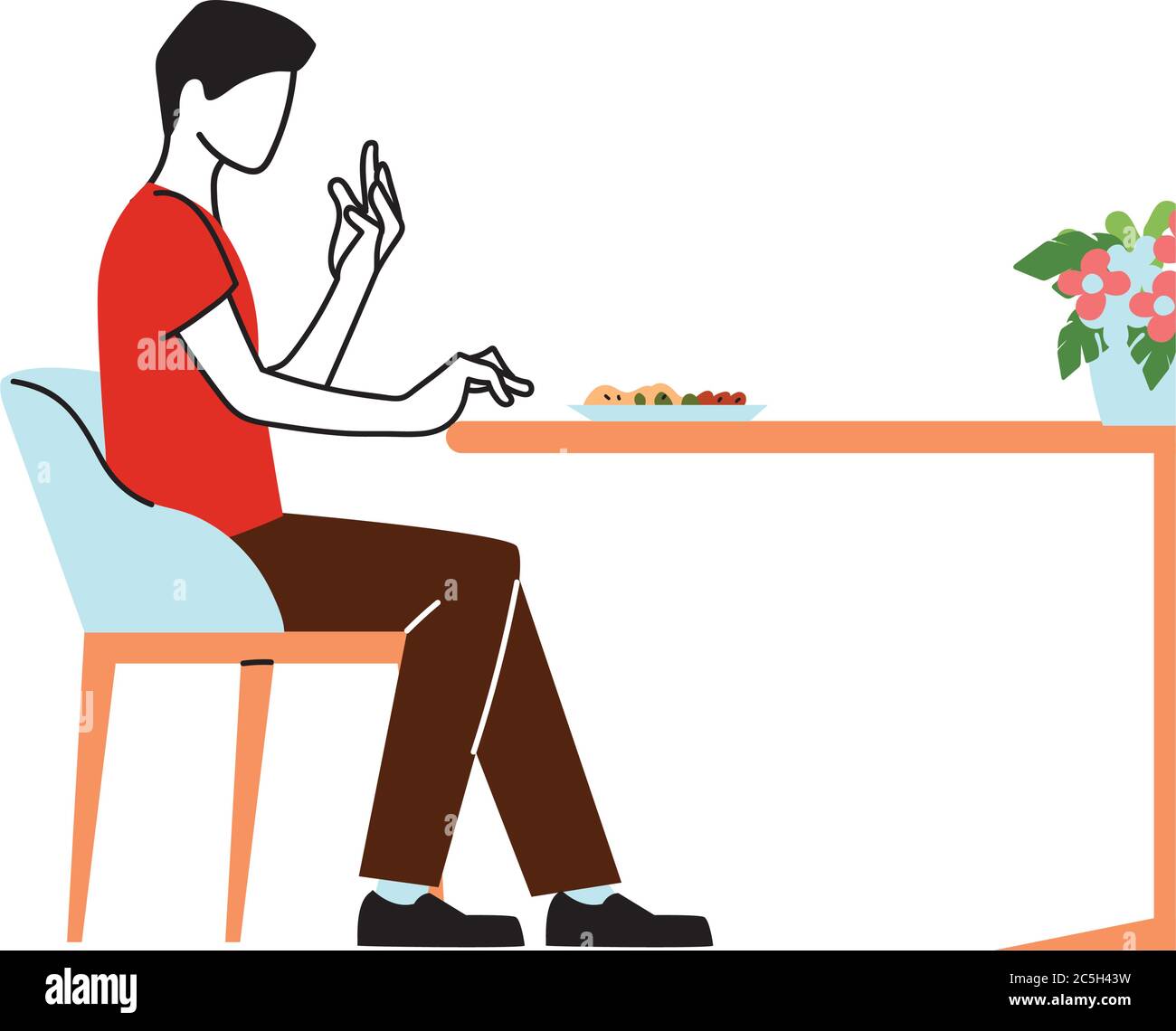 Man sitting at table with plate and flowers design, Restaurant ...