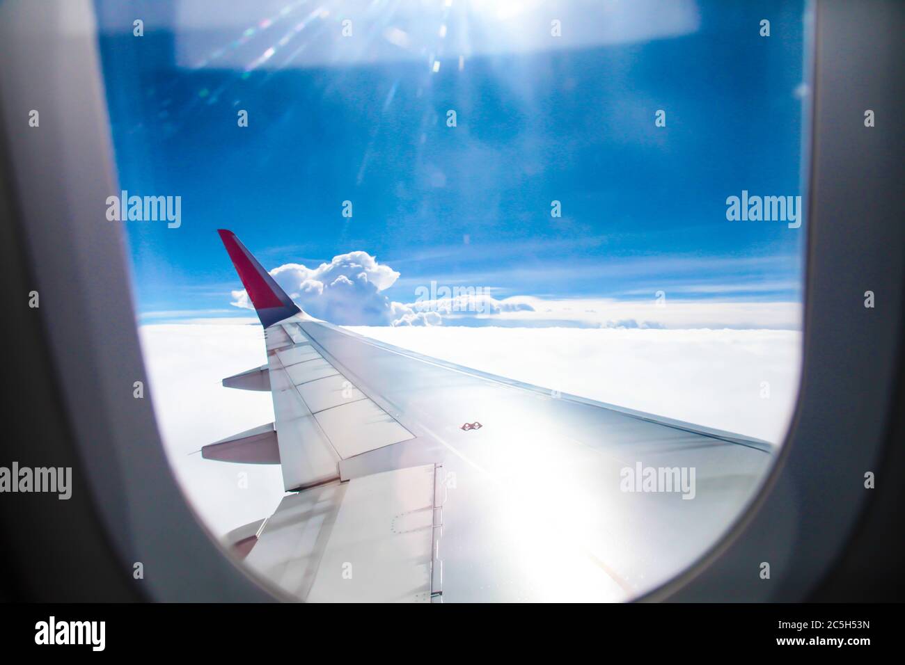 Aircraft Wing on the sky Stock Photo - Alamy