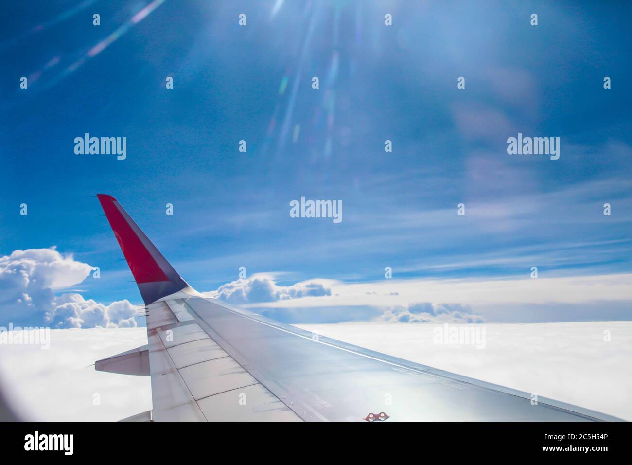 Aircraft Wing on the sky Stock Photo - Alamy