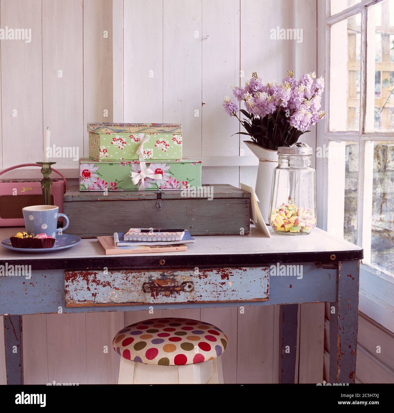 Upcycled office desk used as a table Stock Photo - Alamy