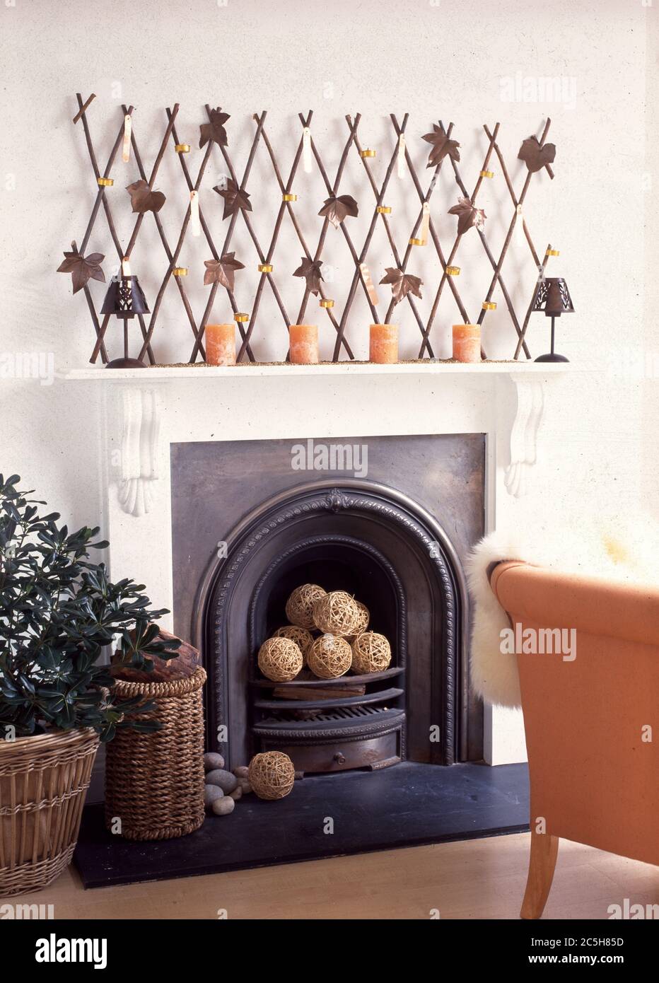 Closeup of victorian fireplace filled with rubber band balls Stock ...