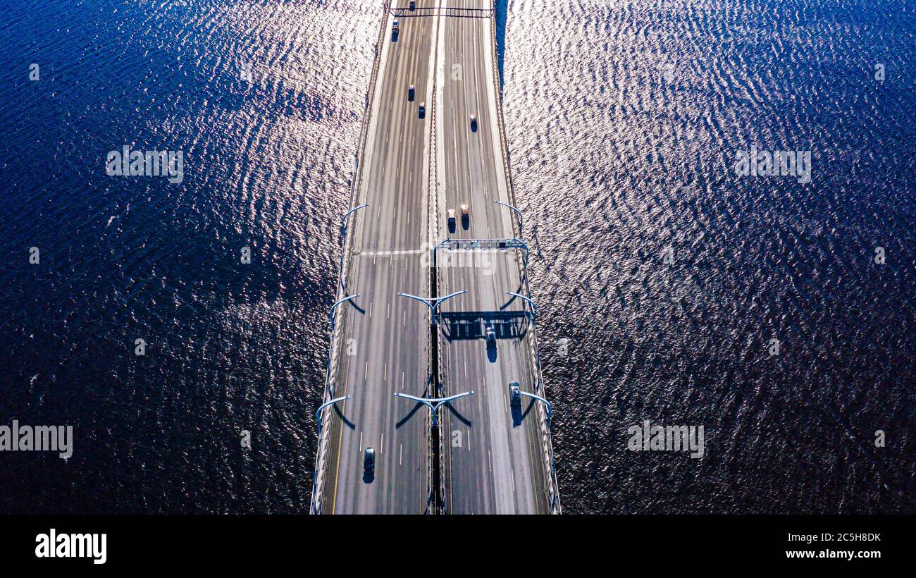 Aerial view of a high way road on the bridge, with moving cars traffic ...