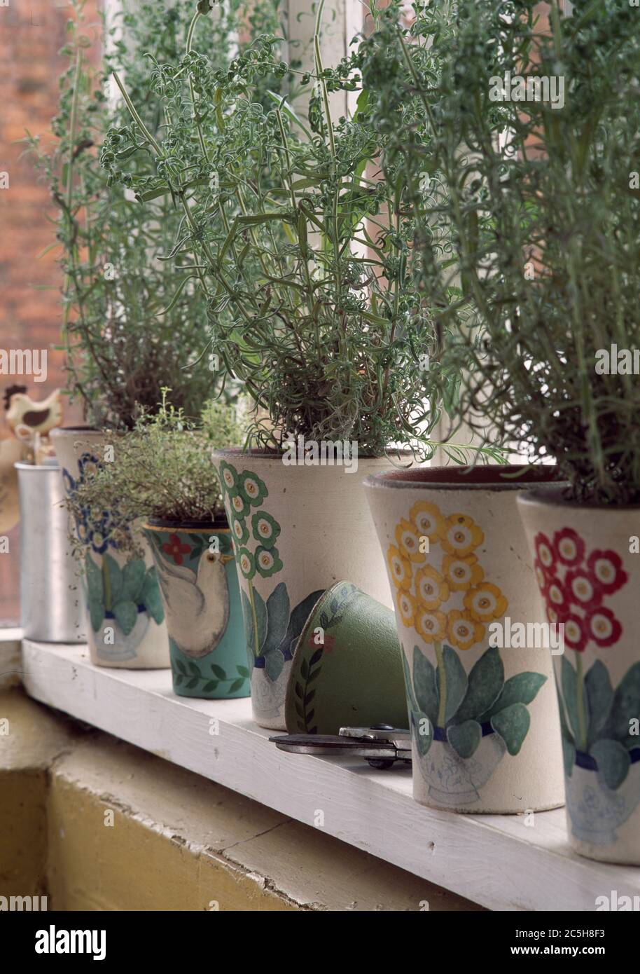 Flower filled pots hi-res stock photography and images - Alamy