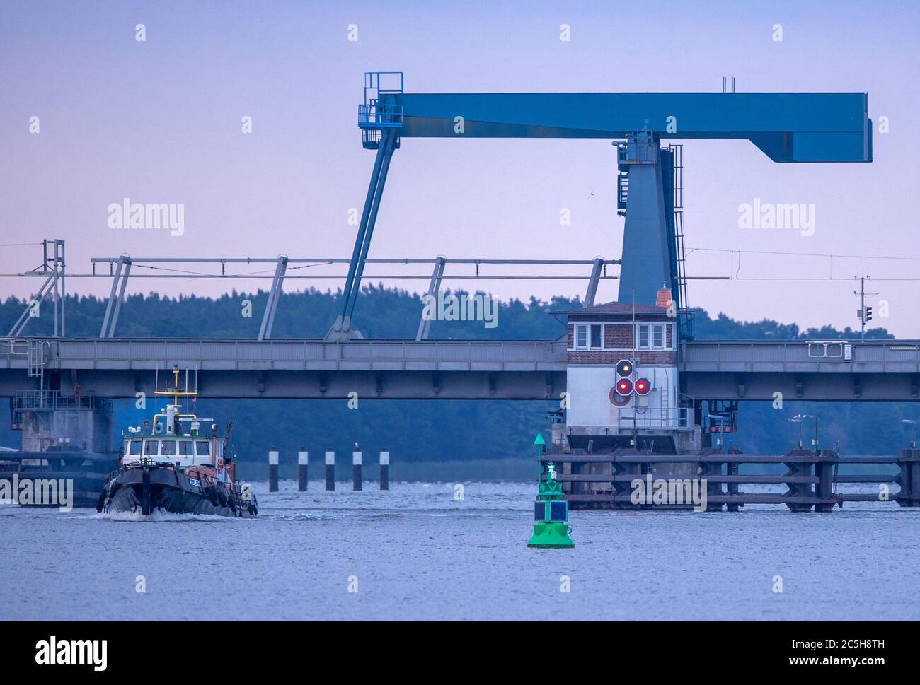 Stralsund, Germany. 30th June, 2020. The flap bridge in the Rügen dam ...