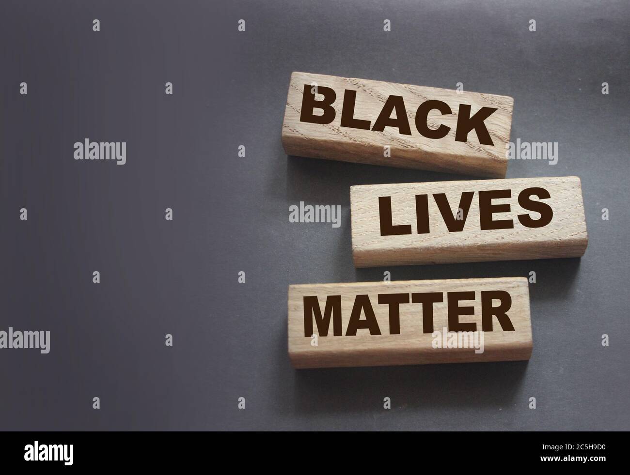 Black lives matter words on Wooden building blocks on black background ...