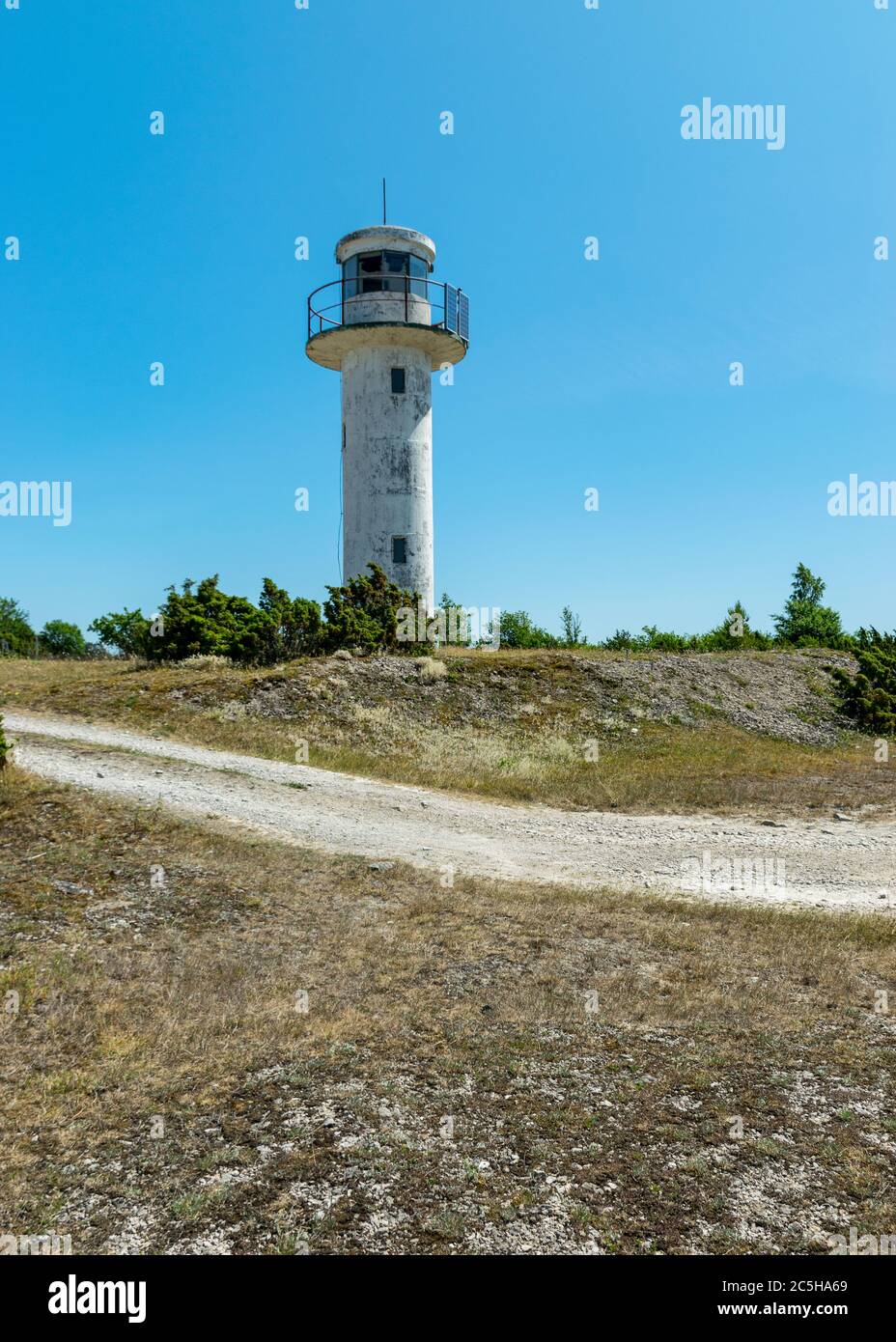 summer view of an old abandoned lighthouse by the sea, Saaremaa Island ...